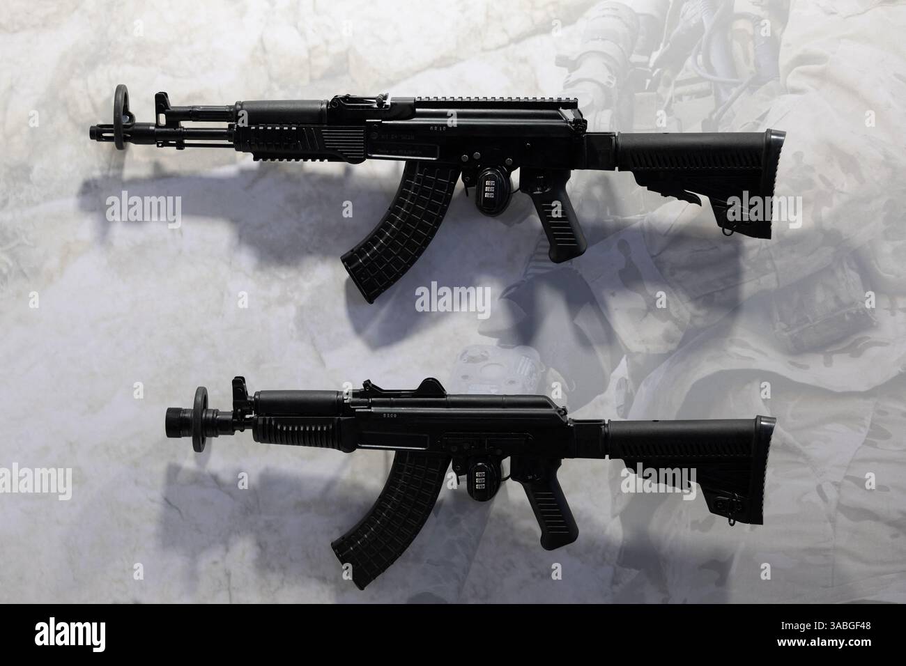 Military look at a assault rifle during The Special Operations Forces ...