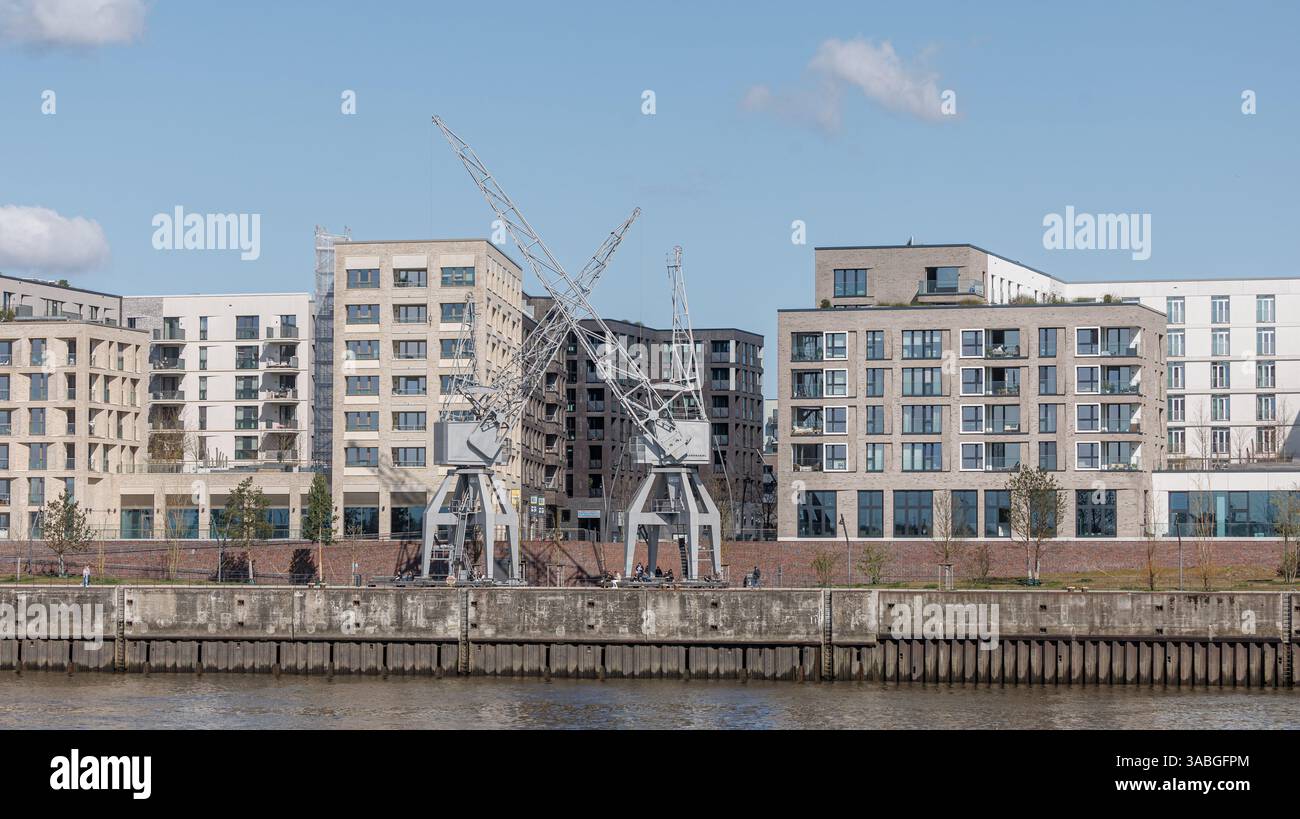 Hamburg, Germany. 01st Apr, 2025. View of new apartments and historic ...