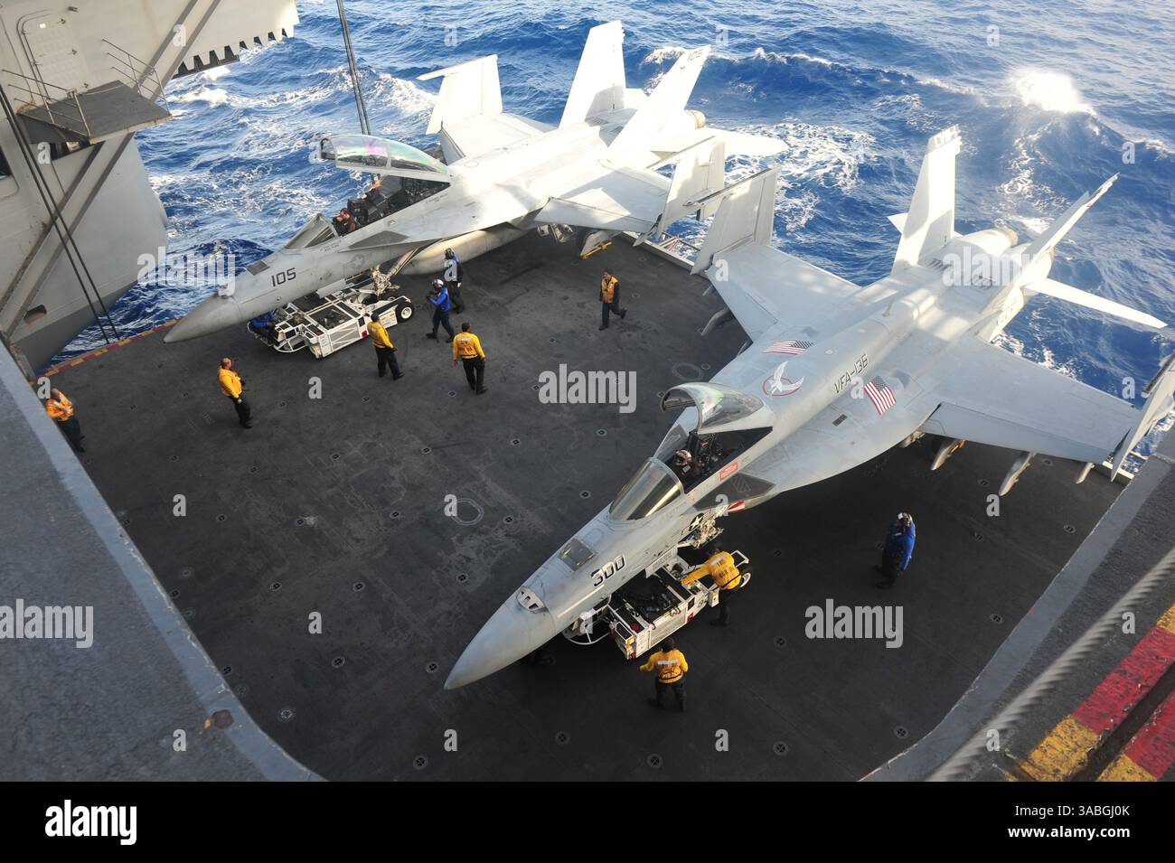 April 17, 2018 - At sea - U.S. Navy sailors lower aircraft from the ...
