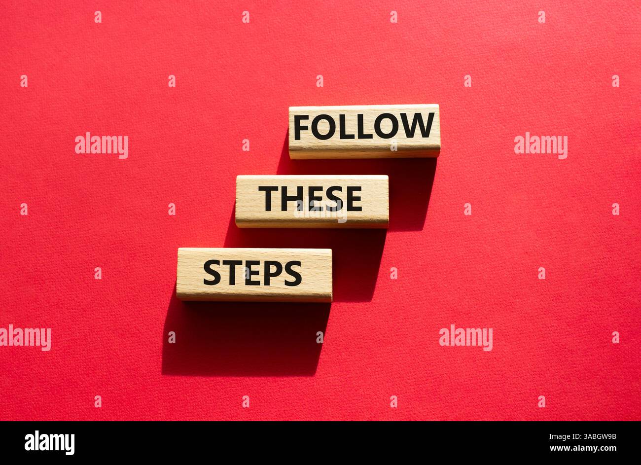 Follow these steps symbol. Wooden blocks with words Follow these steps ...