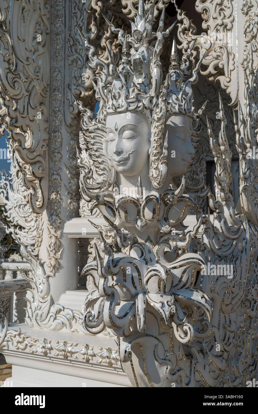 The White Temple, also known as Wat Rong Khun, is completely white and ...