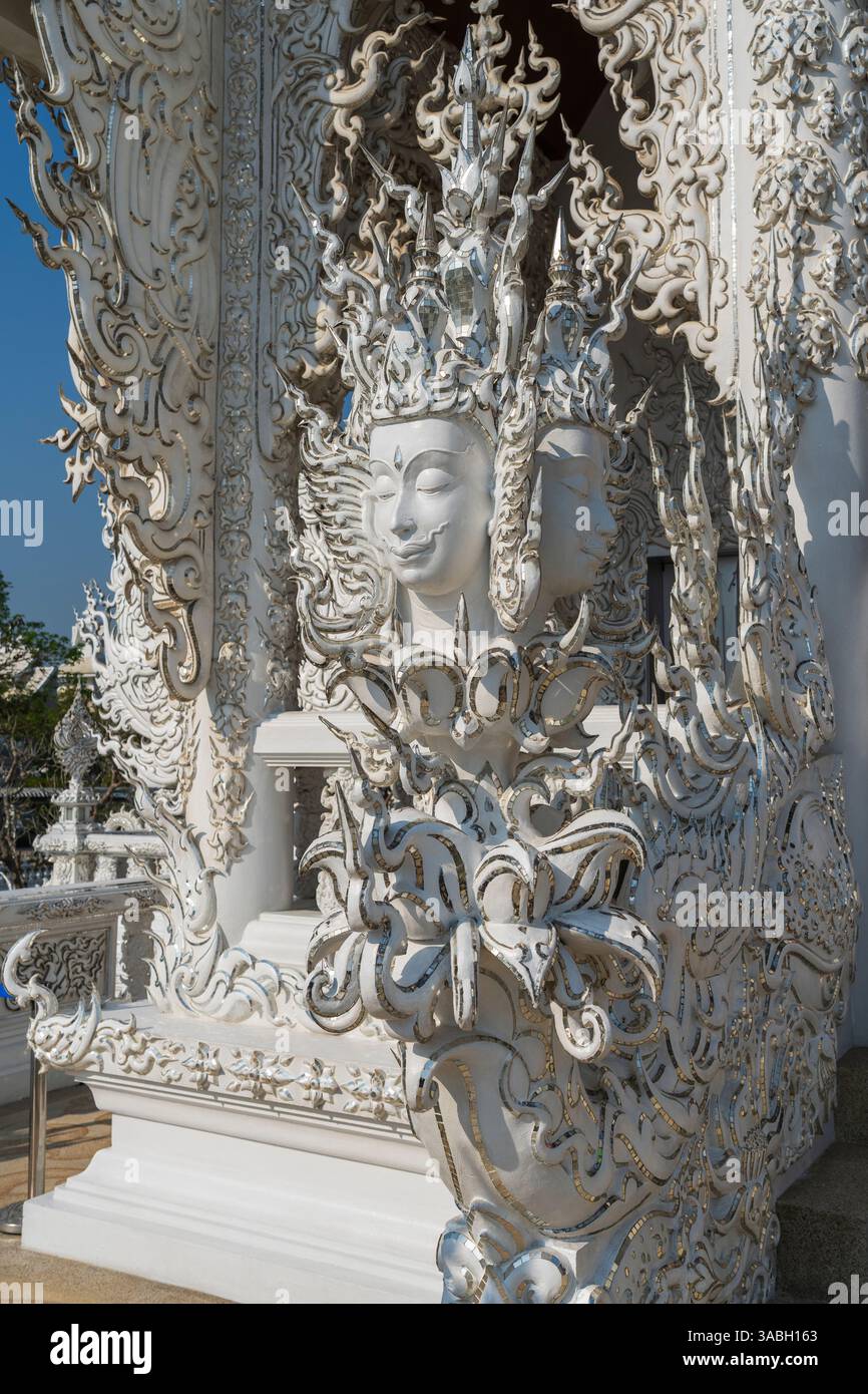 The White Temple, also known as Wat Rong Khun, is completely white and ...