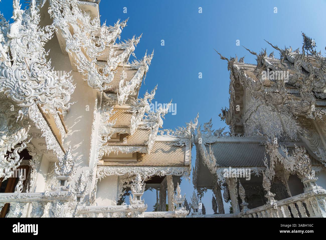 The White Temple, also known as Wat Rong Khun, is completely white and ...