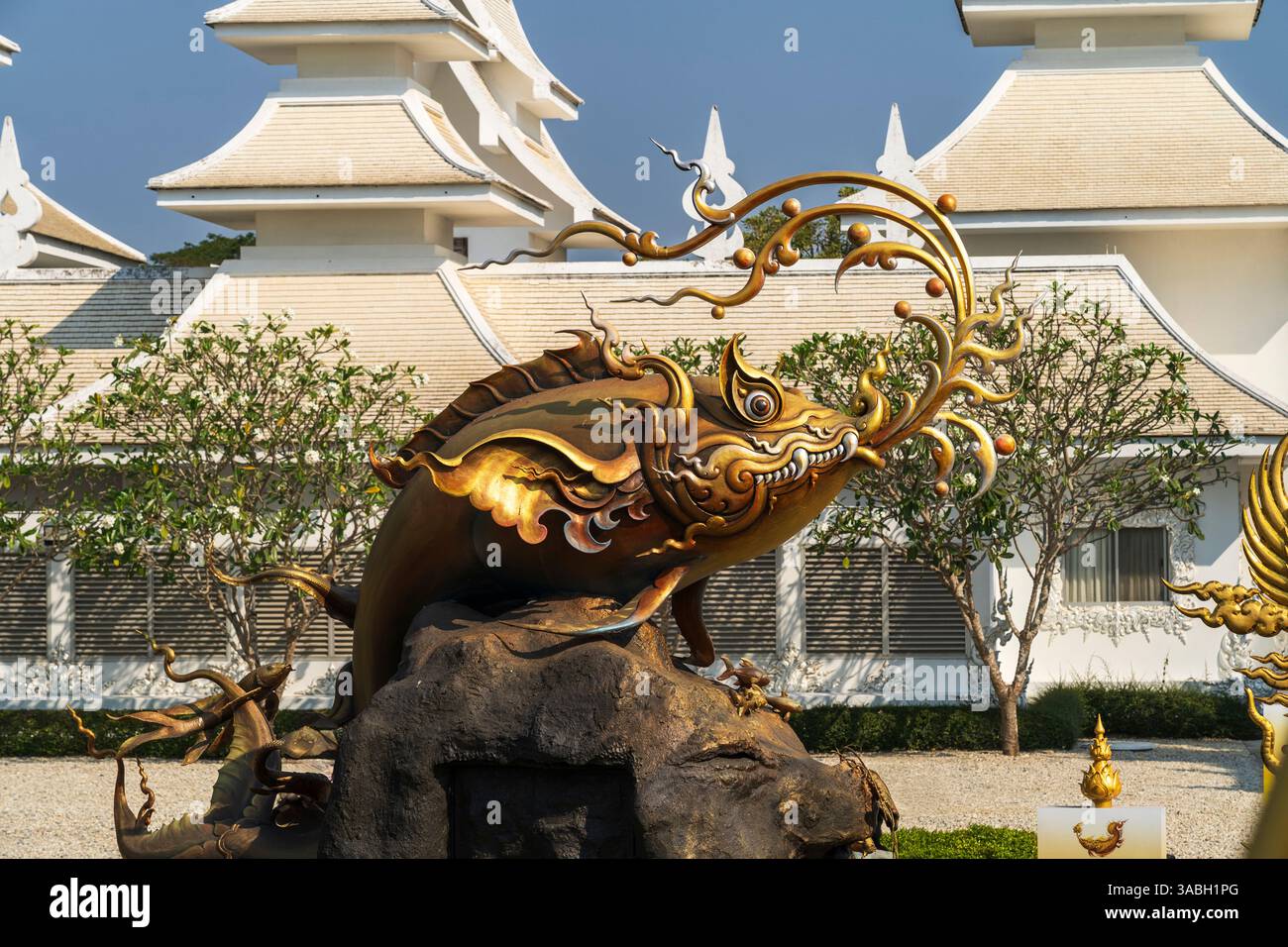 The White Temple, also known as Wat Rong Khun, is completely white and ...