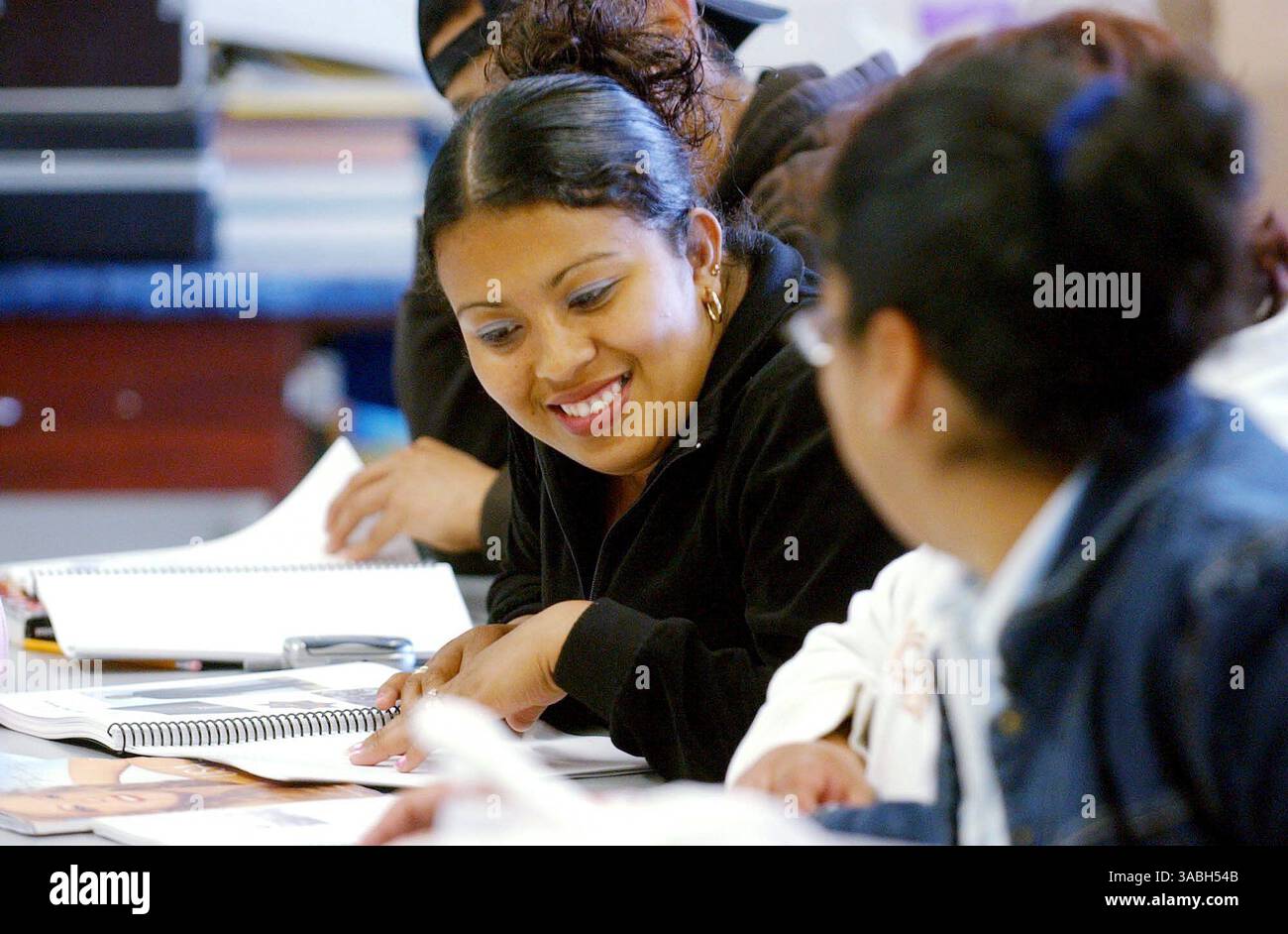 Heidi Paredes smiles during English as a second language class Thursday ...