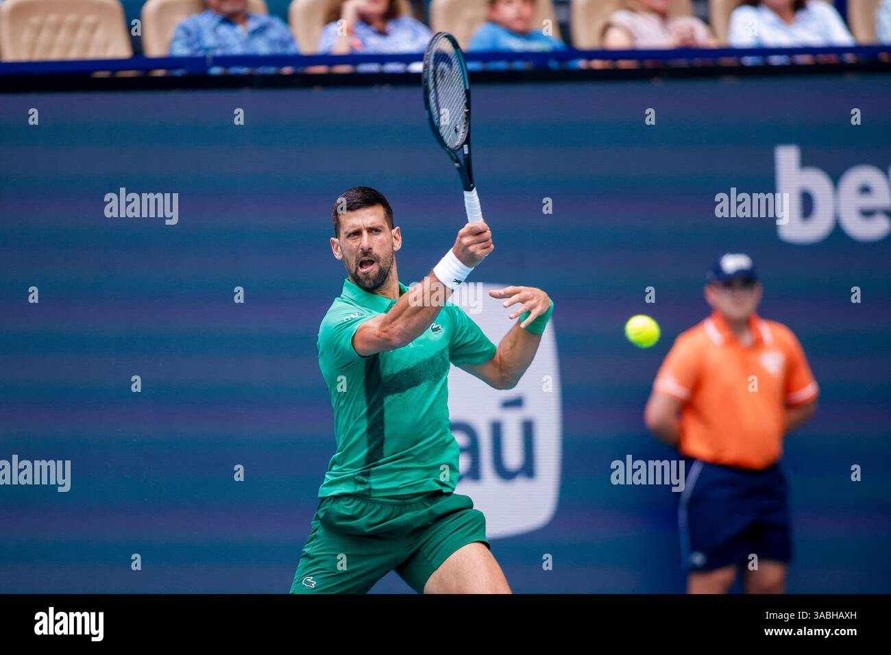 MIAMI GARDENS, FL - MARCH 28: Novak Djokovic (SRB) in action against ...
