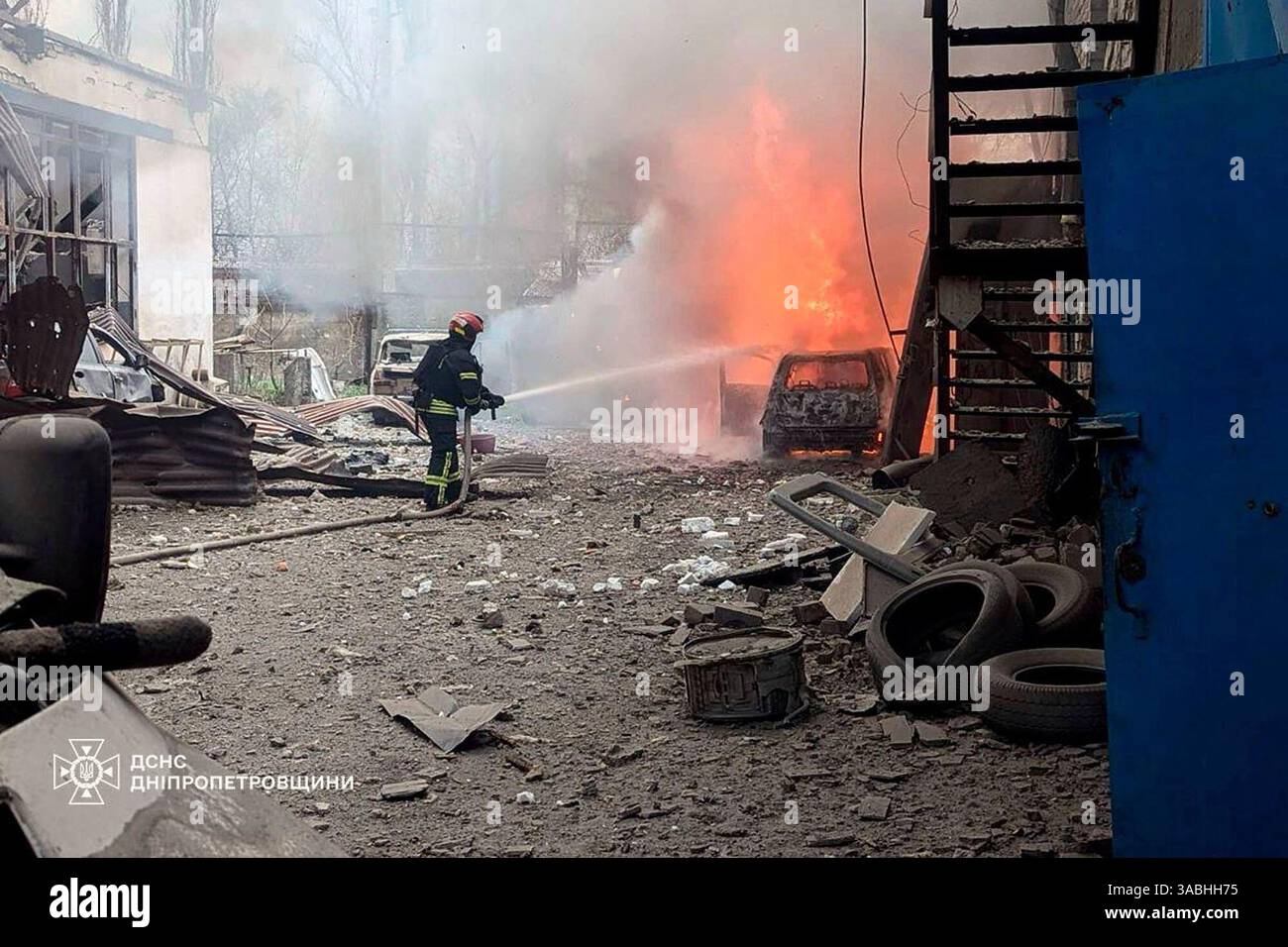In this photo provided by the Ukrainian Emergency Service, firefighters ...