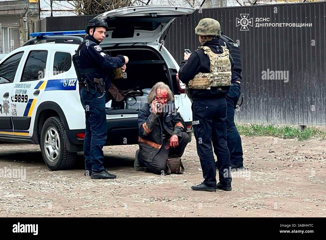 In this photo provided by the Ukrainian Emergency Service, a wounded ...