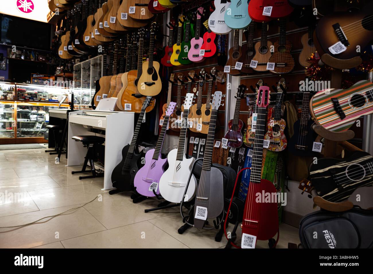 Lviv, Ukraine - April 01, 2025: A vibrant collection of guitars and ...