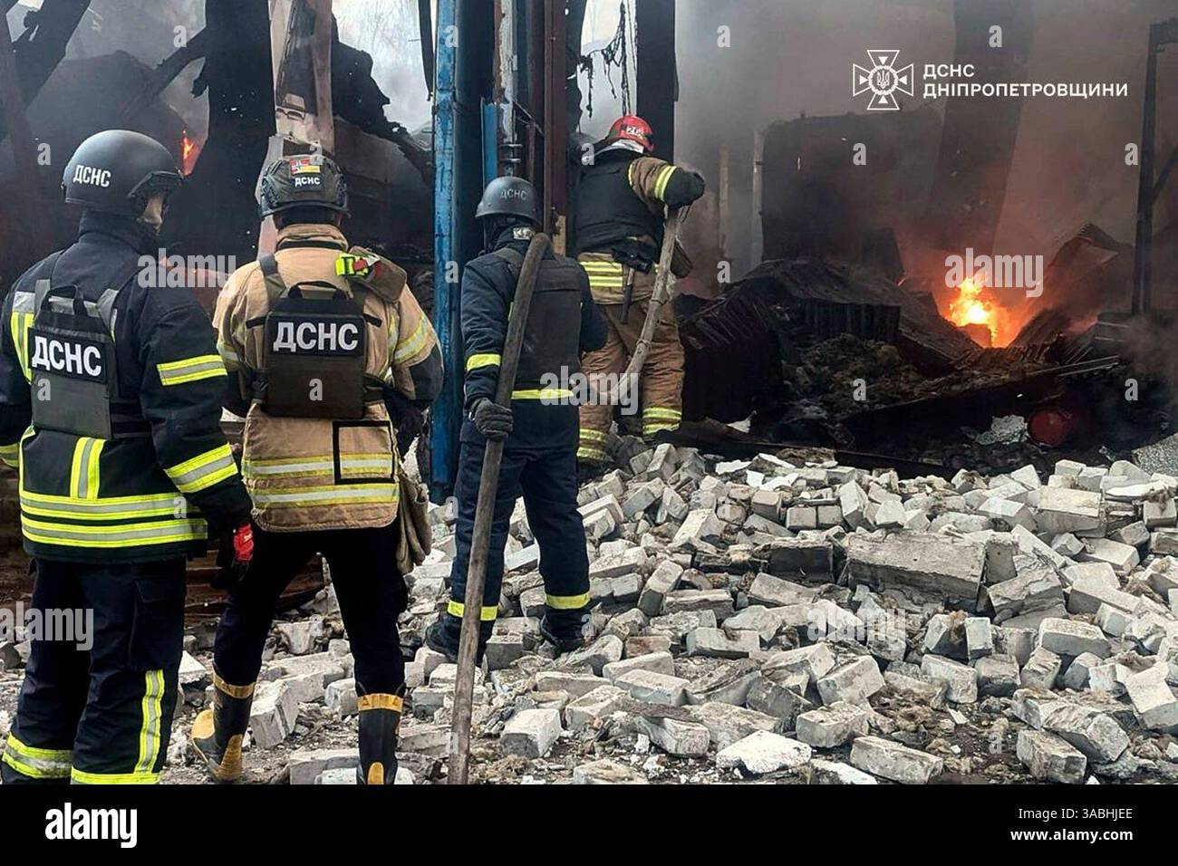 In this photo provided by the Ukrainian Emergency Service, firefighters ...
