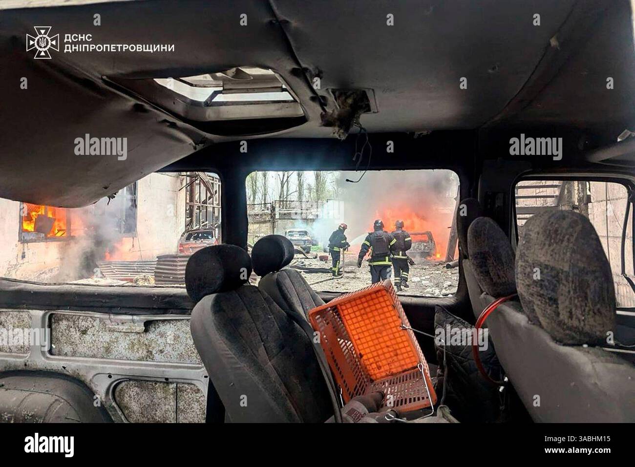 In this photo provided by the Ukrainian Emergency Service, firefighters ...