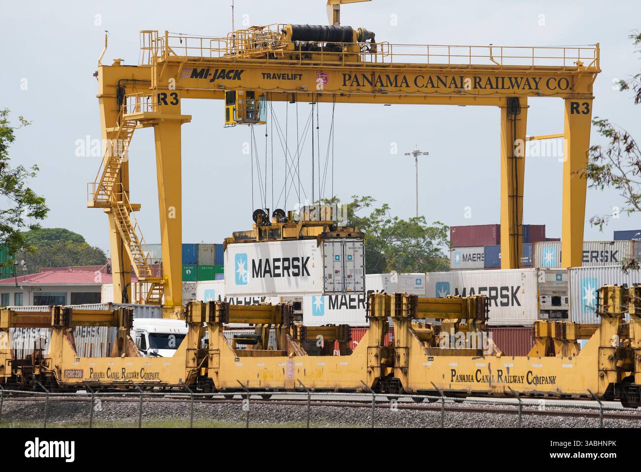 A crane loads a Panama Canal railway train with cargo in Panama City ...