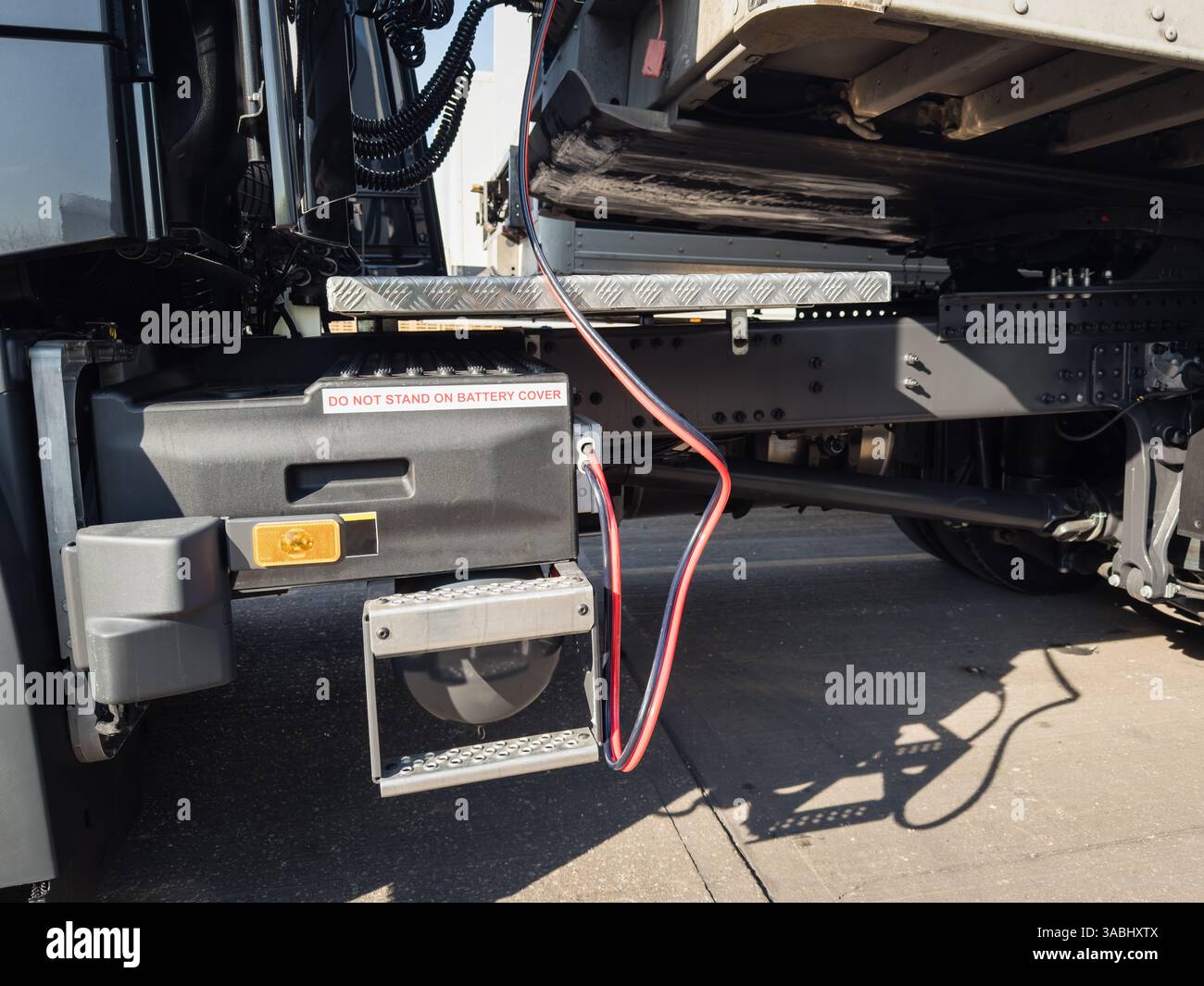 A detailed view of the cable connection between a lorry unit and its ...