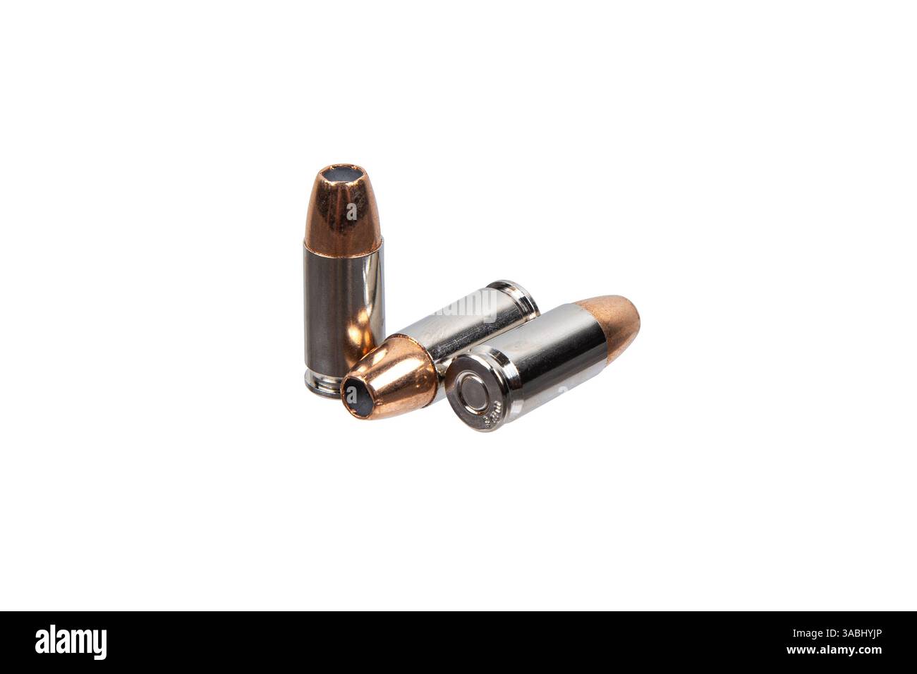 Three hollow-point bullets featuring copper jackets and silver cores ...