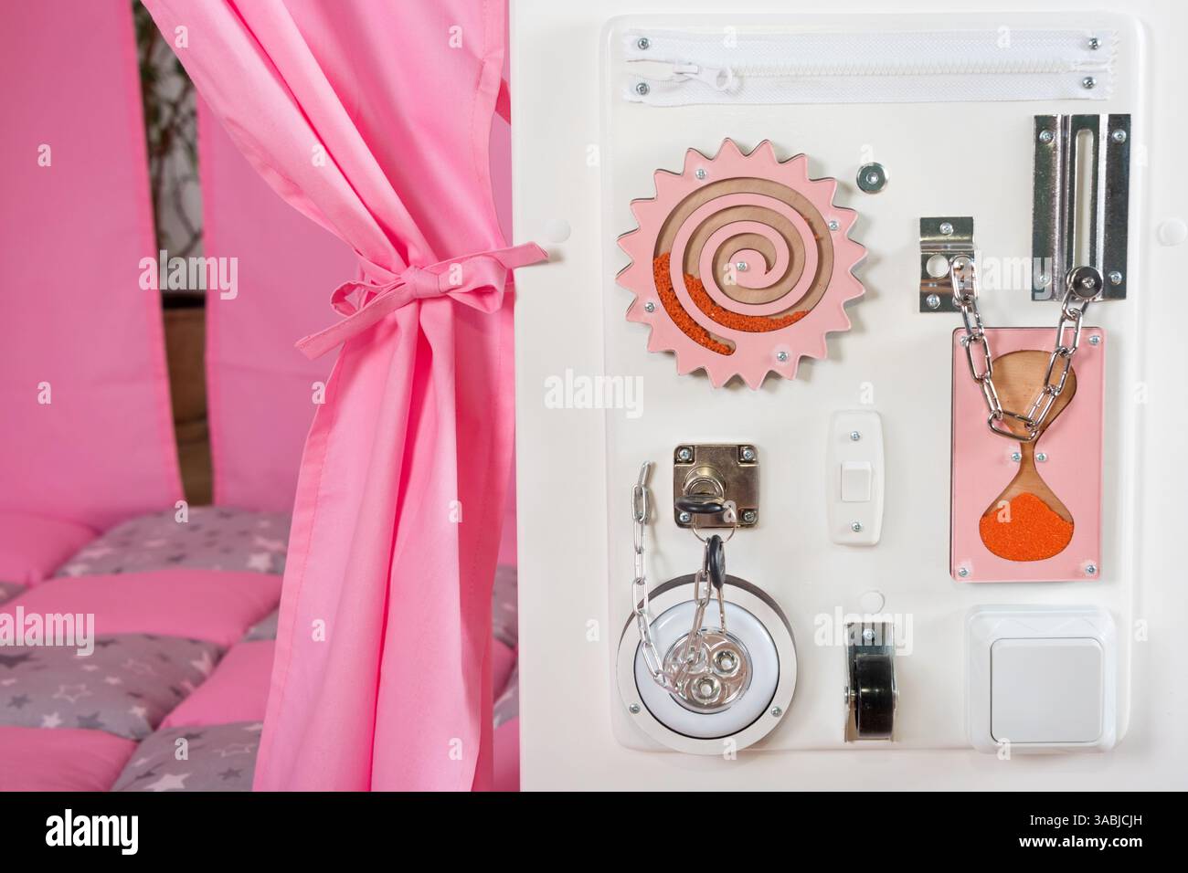 Sensory activity board with locks, switches, components designed to ...