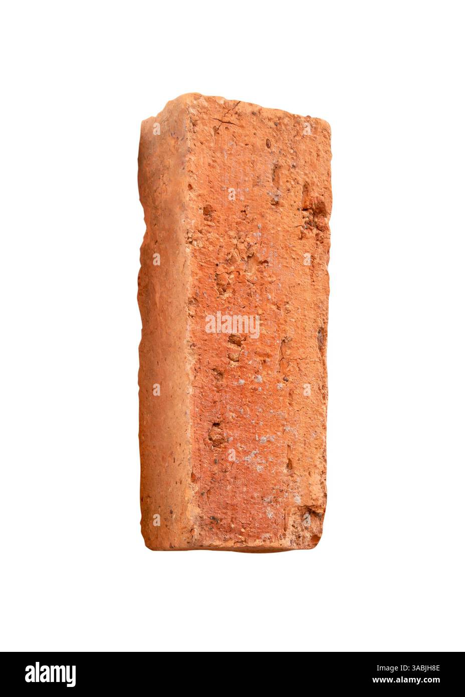 Side view of single cracked old red or orange brick is isolated on ...