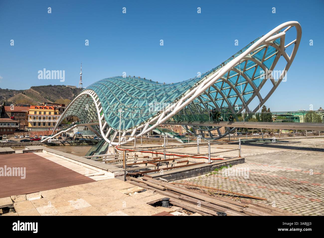 Peace bridge, steel and glass construction pedestrian bridge over Kura ...