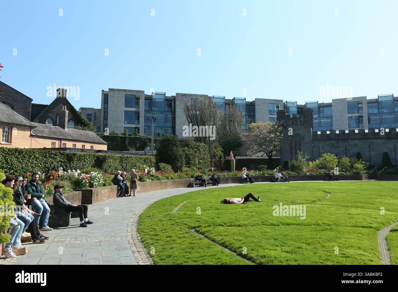 Dublin, Ireland - 2nd April 2025 - People relax in Dubh Linn Garden ...
