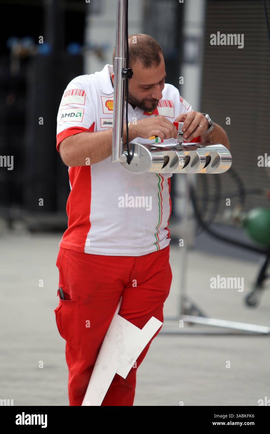 Ferrari mechanic works on pit equipment...Formula One World ...