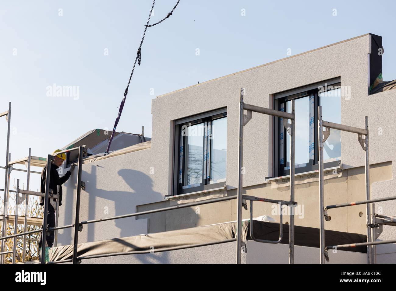 Cologne, Germany. 02nd Apr, 2025. A wall with windows for a ...