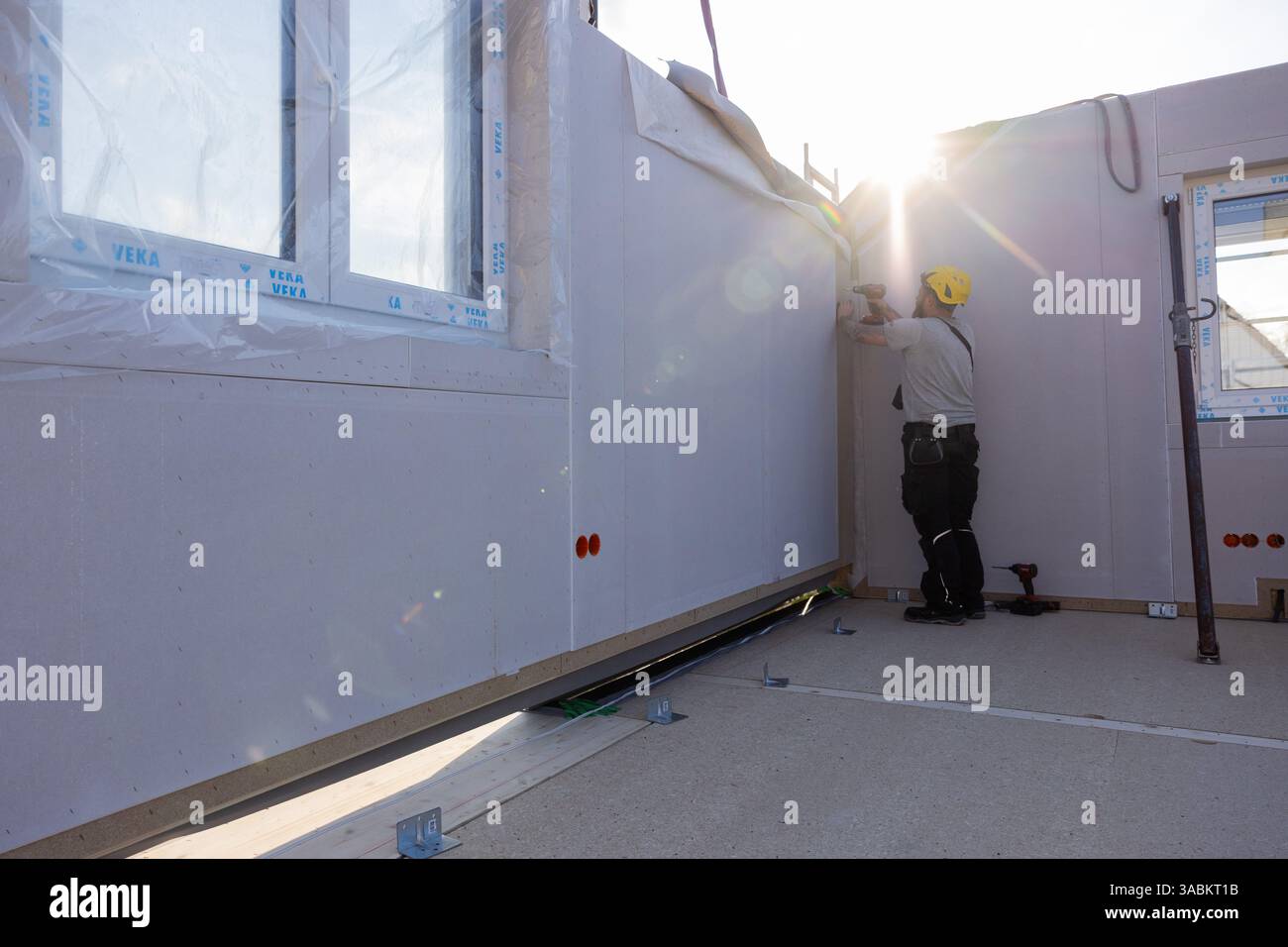 Cologne, Germany. 02nd Apr, 2025. A wall with windows for a ...