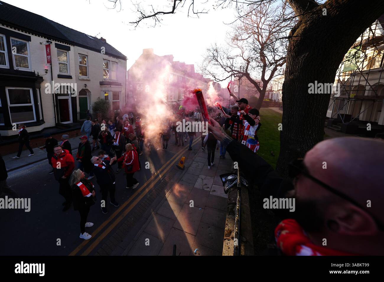 Liverpool fans set off flares ahead of the Premier League match between ...