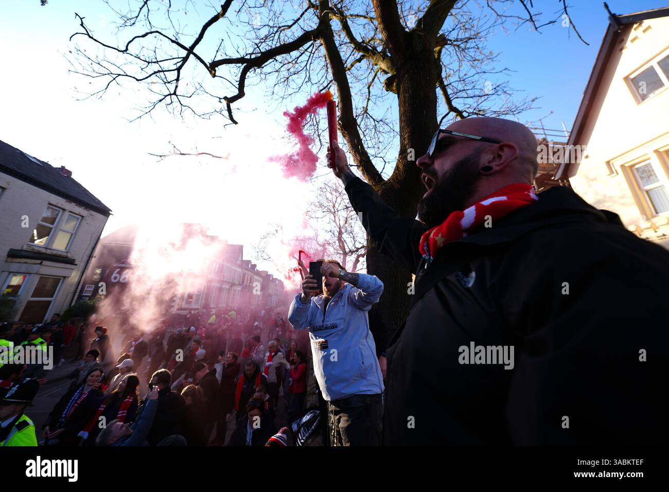 Liverpool fans set off flares ahead of the Premier League match between ...