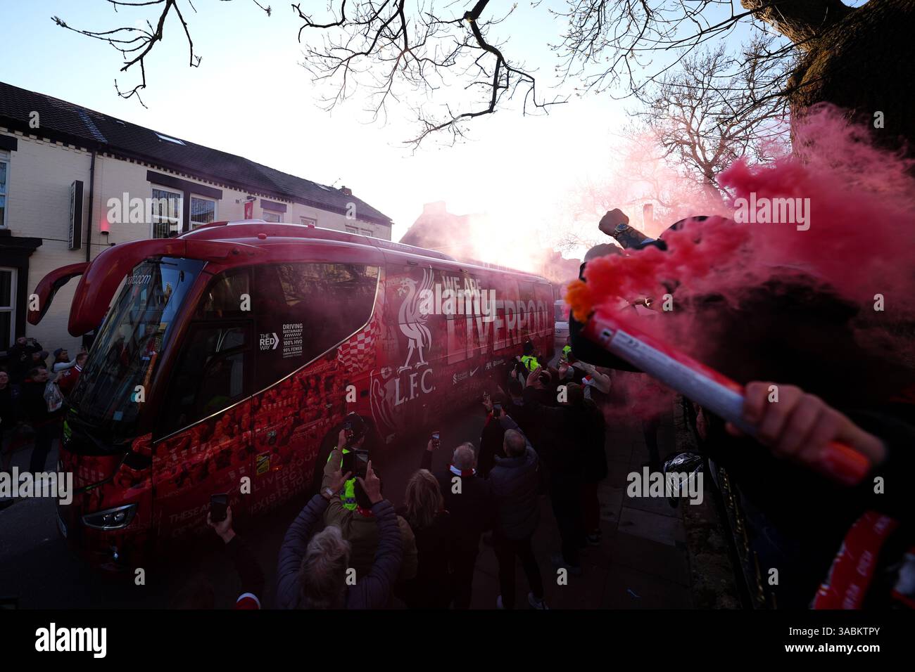 Liverpool fans set of flares as the Liverpool team coach arrives ahead ...