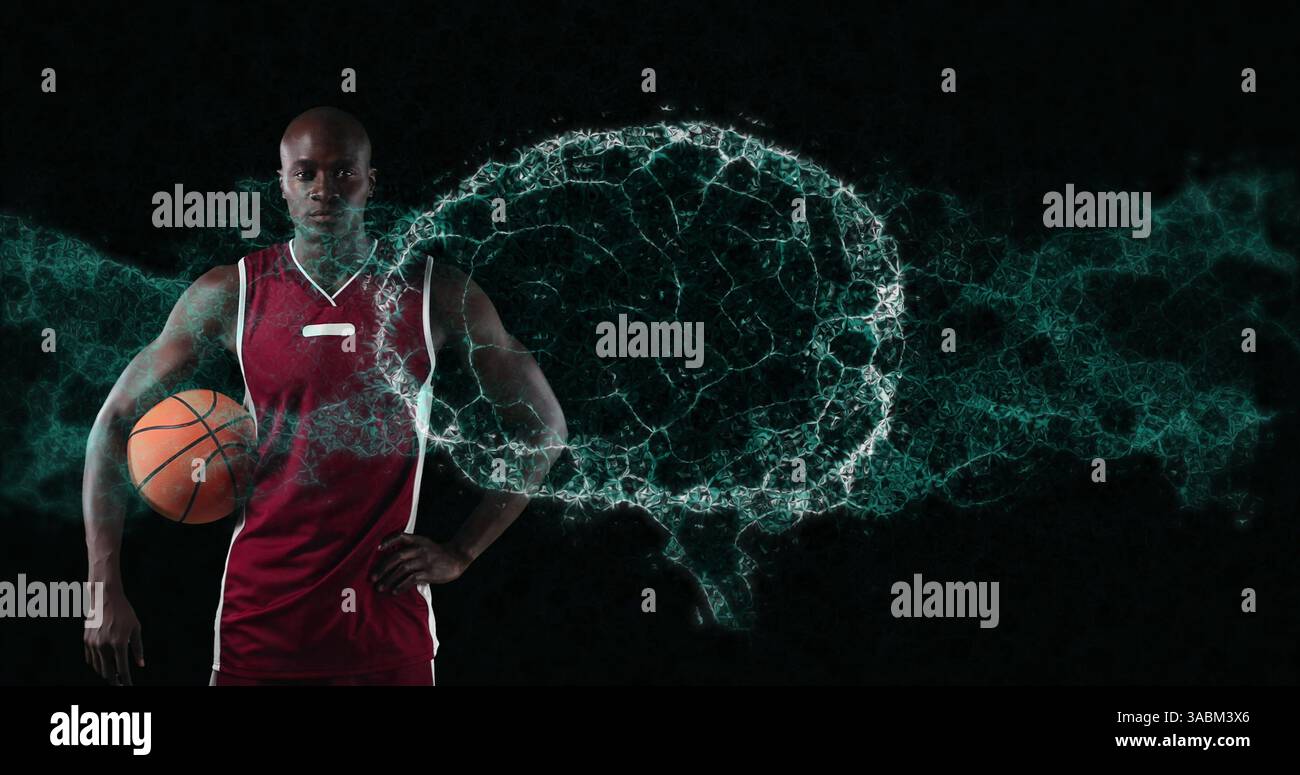 Image of digital brain spinning over male basketball player holding ...