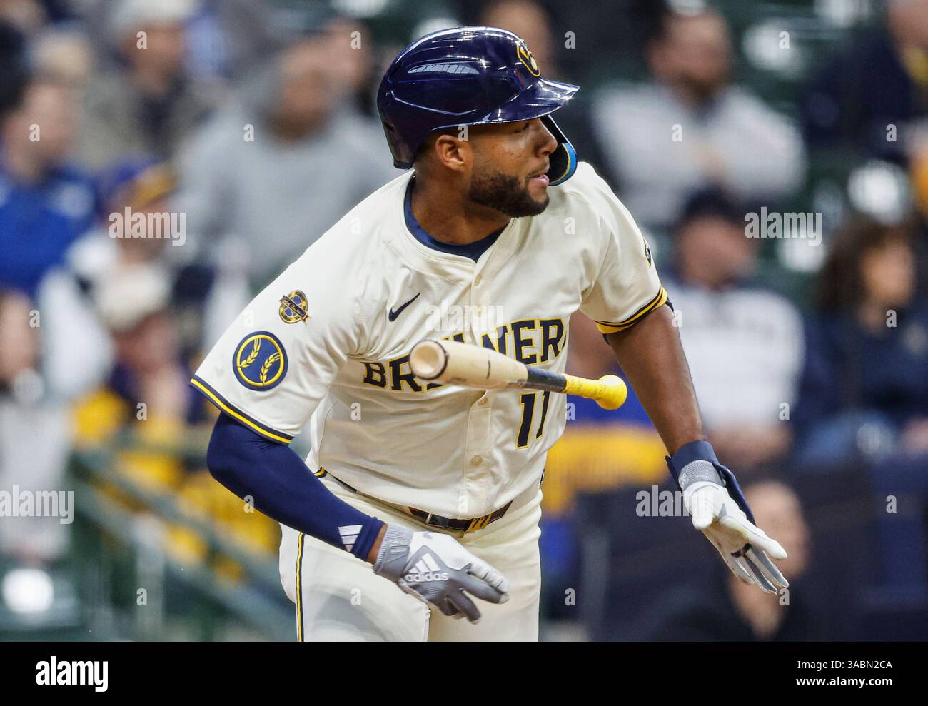 Milwaukee Brewers' Jackson Chourio (11) runs out a base hit during the ...