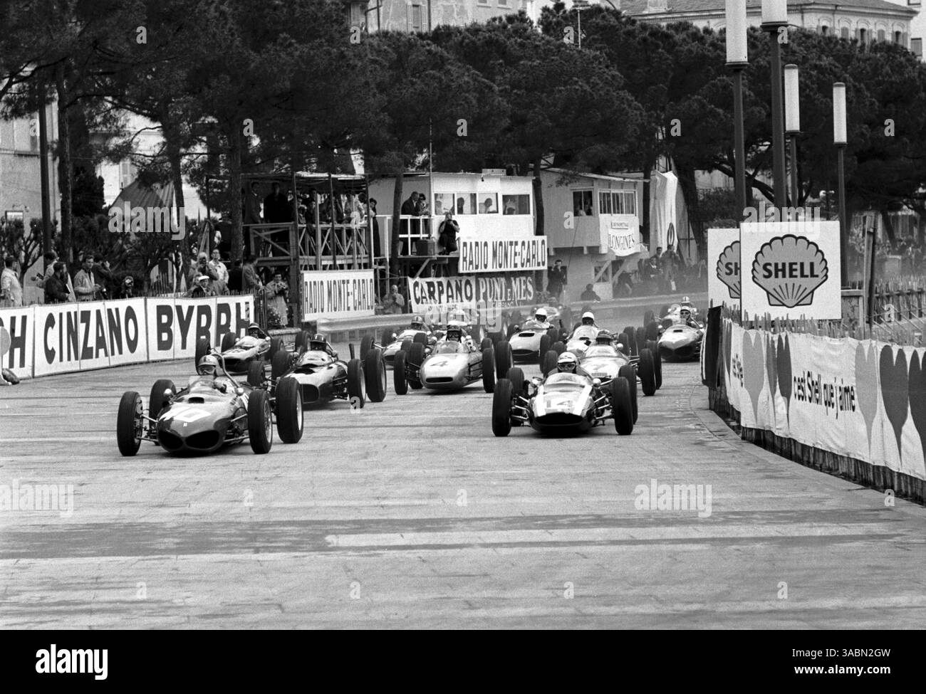 Willy Mairesse (BEL) (left) Ferrari 156 shot past race winner Bruce ...