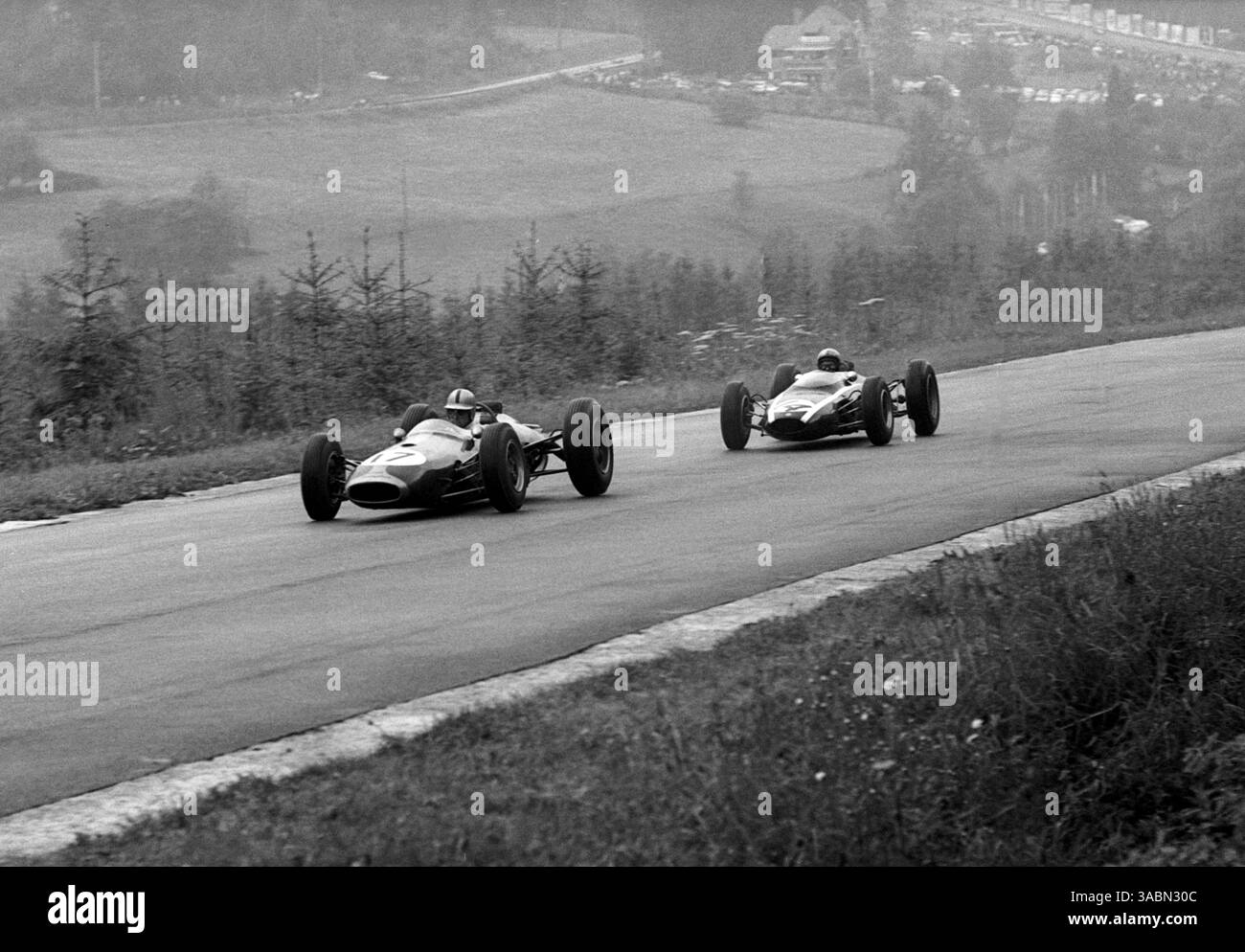 Jack Brabham (AUS) Brabham BT3, who retired with a fuel injection pump ...