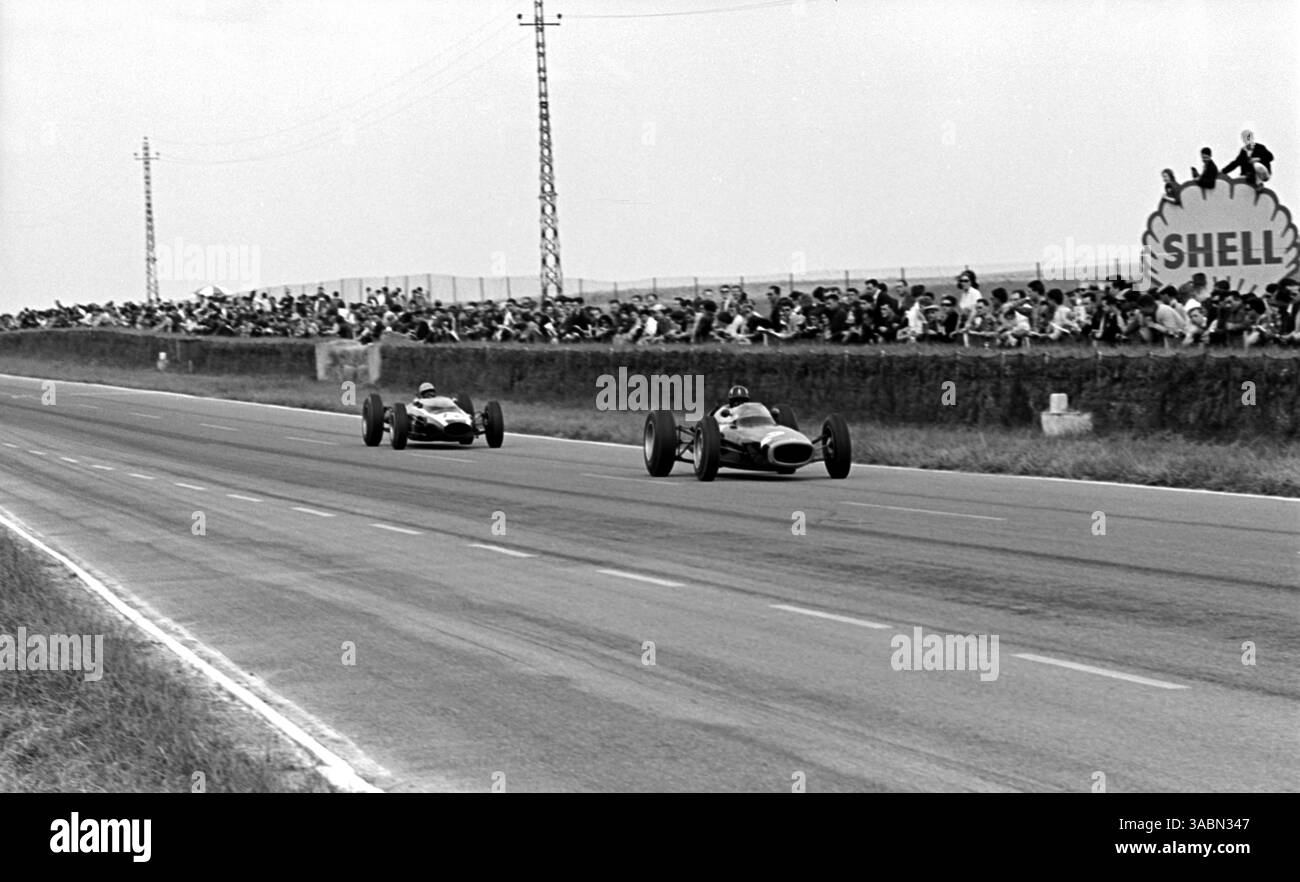 Third place finisher Graham Hill (GBR) BRM T61 is pursued by Tony Maggs ...
