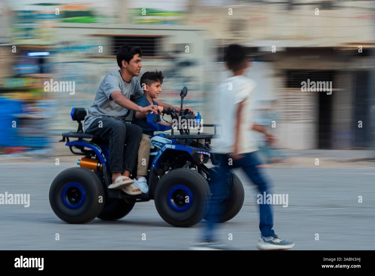 Children enjoy a ride during Eid al- Fitr celebrations, that marks the ...