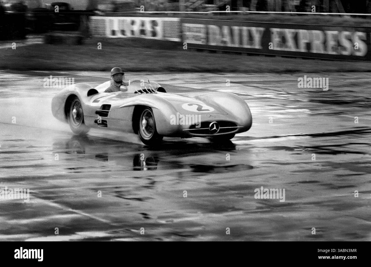 Karl Kling (GER) Mercedes-Benz W196 in Woodcote corner...British Grand ...