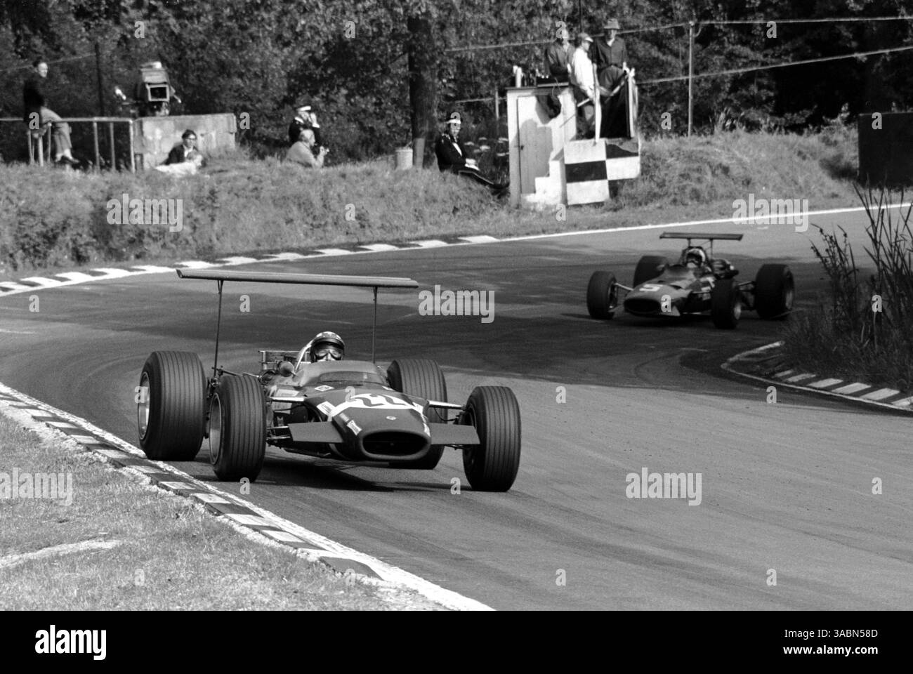 Race winner Jo Stiffert (SUI) Lotus 49B leads 2nd placed Chris Amon ...