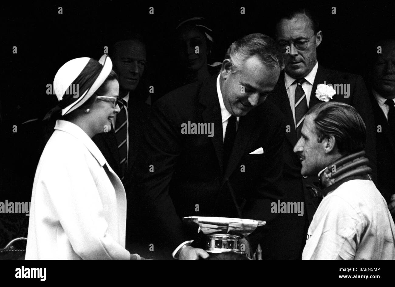 Race winner Graham Hill (GBR) receives his trophy from HSH Princess ...