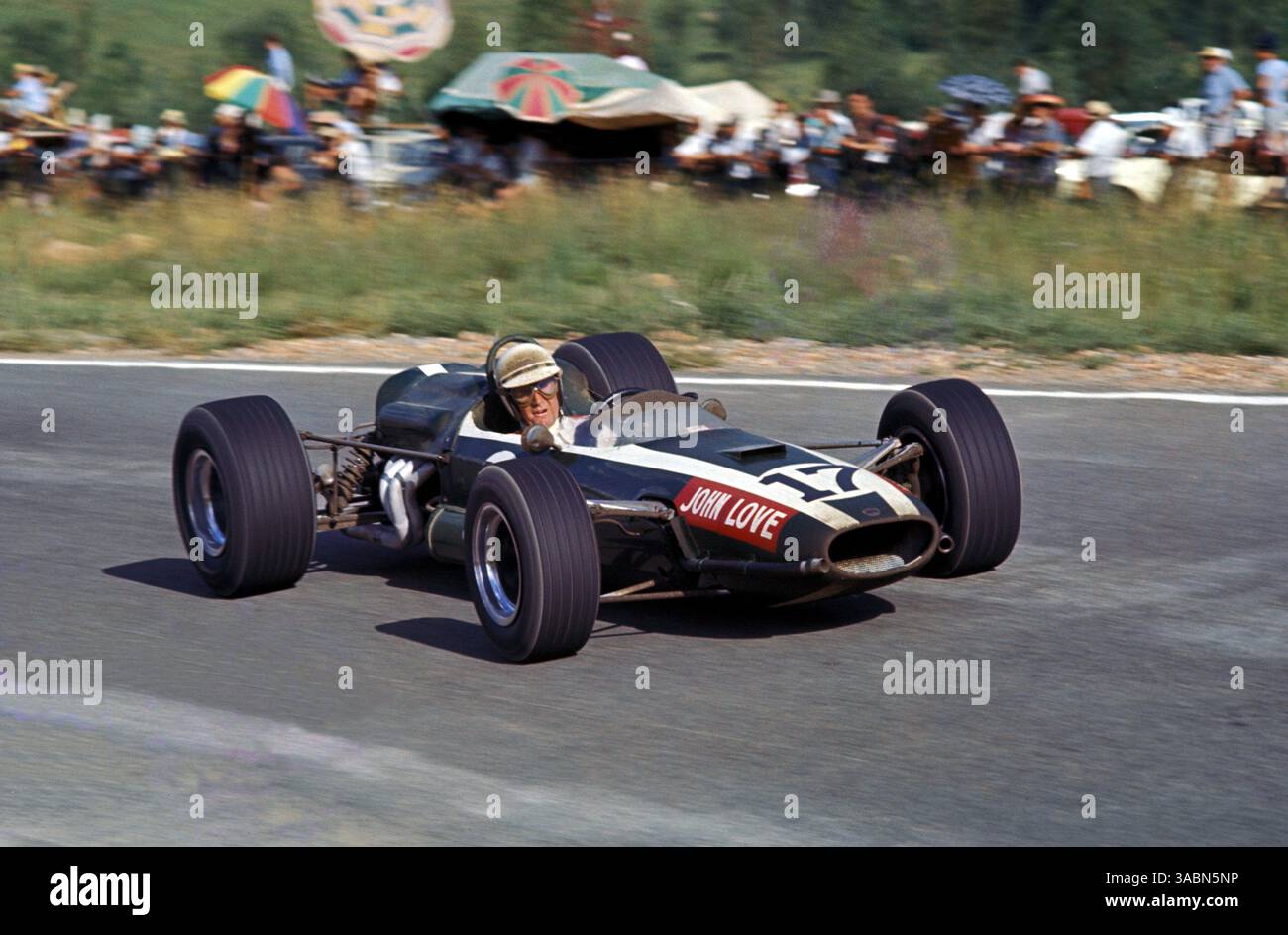John Love (RHO) Cooper Climax T79, 2nd place...Formula One World Championship, Rd1, South ...