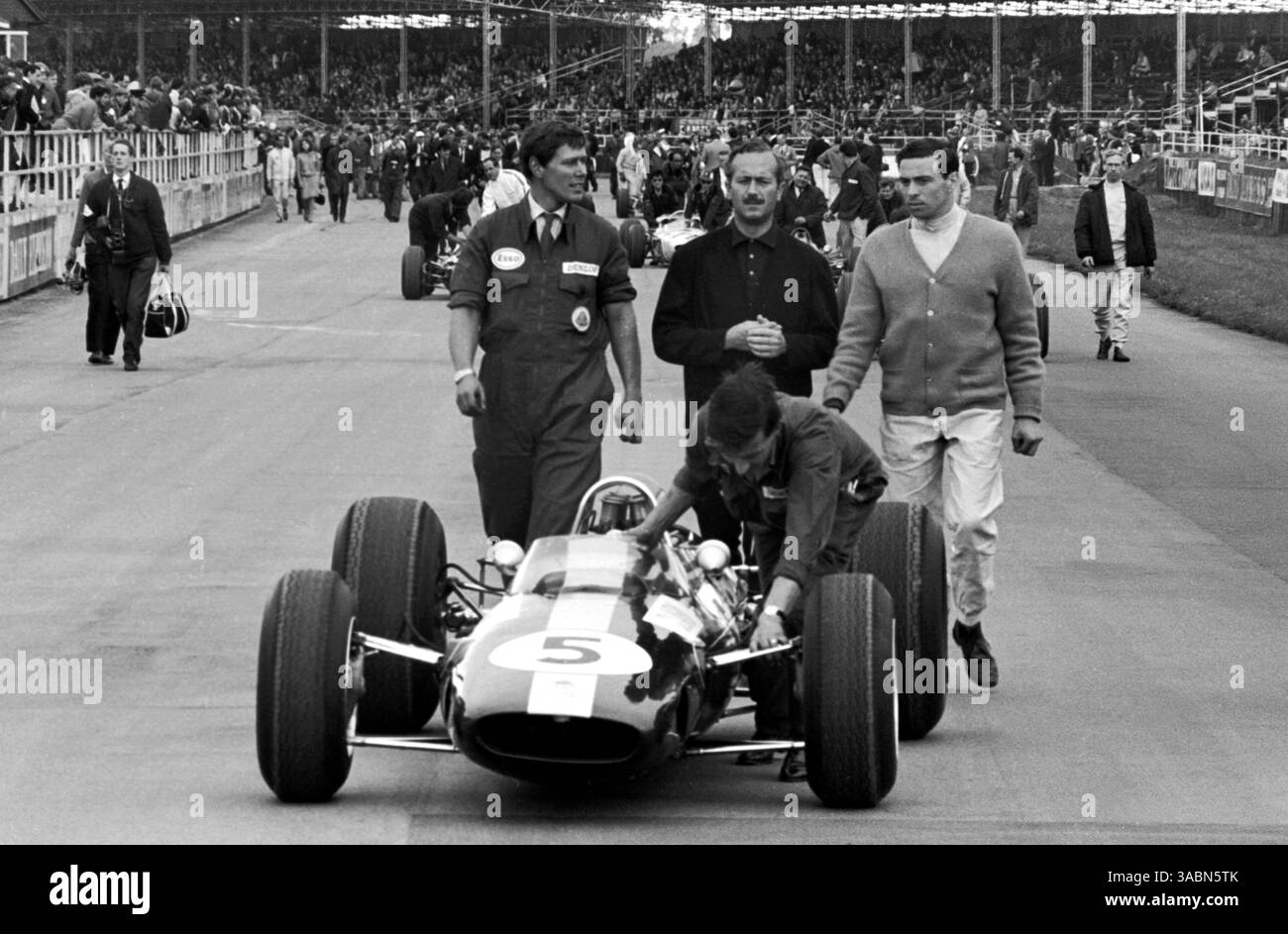 Lotus Owner Colin Chapman (GBR) (Centre) and race winner Jim Clark (GBR ...