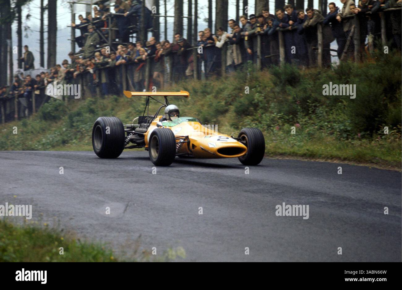 The distinctive yellow McLaren Cosworth M7A of Bruce McLaren (NZL ...
