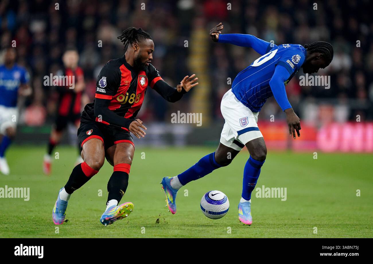 Bournemouth's Antoine Semenyo (left) and Ipswich Town's Axel Tuanzebe ...