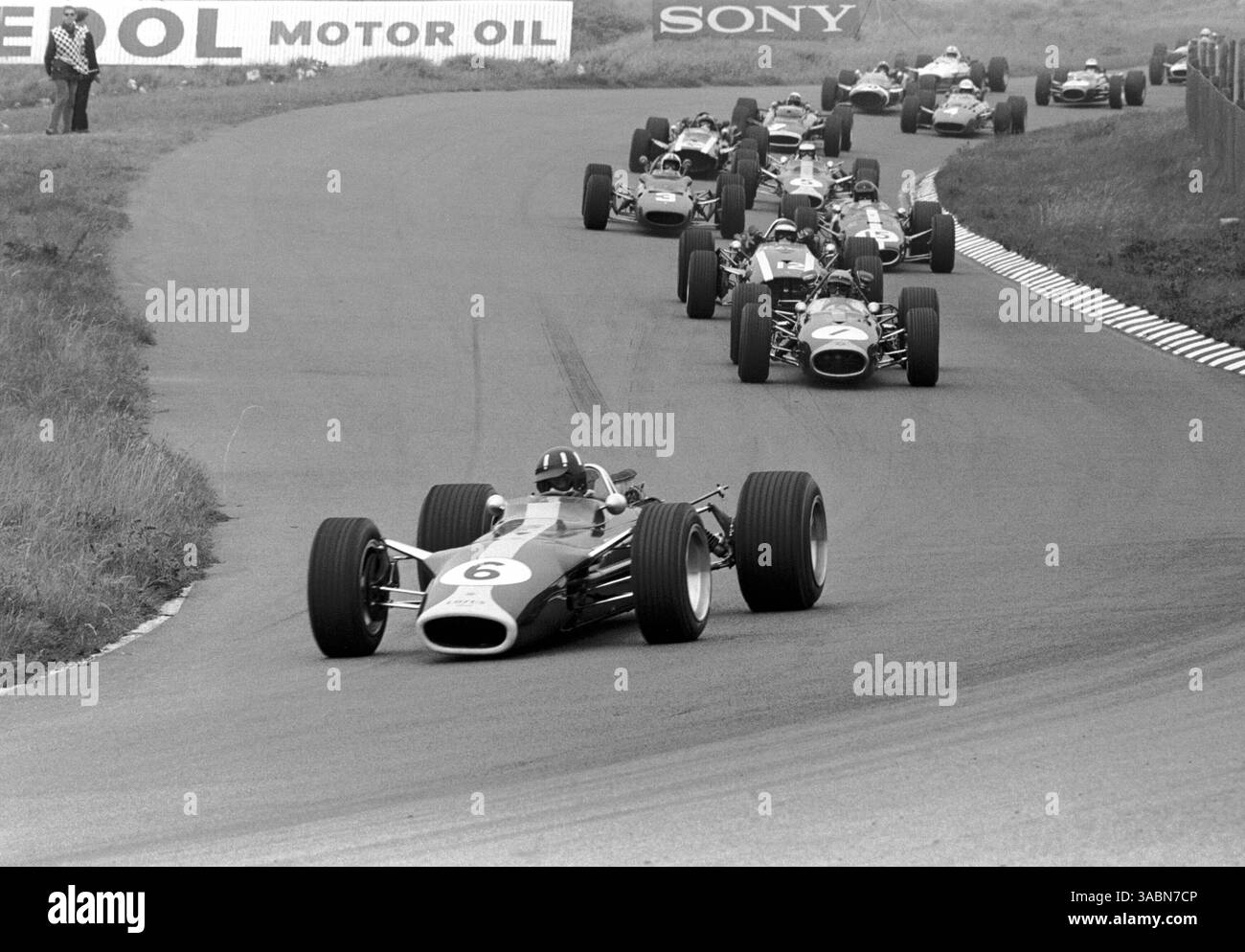 Graham Hill(GBR) Lotus Ford 49 . Hill leads from Jack Brabham and ...