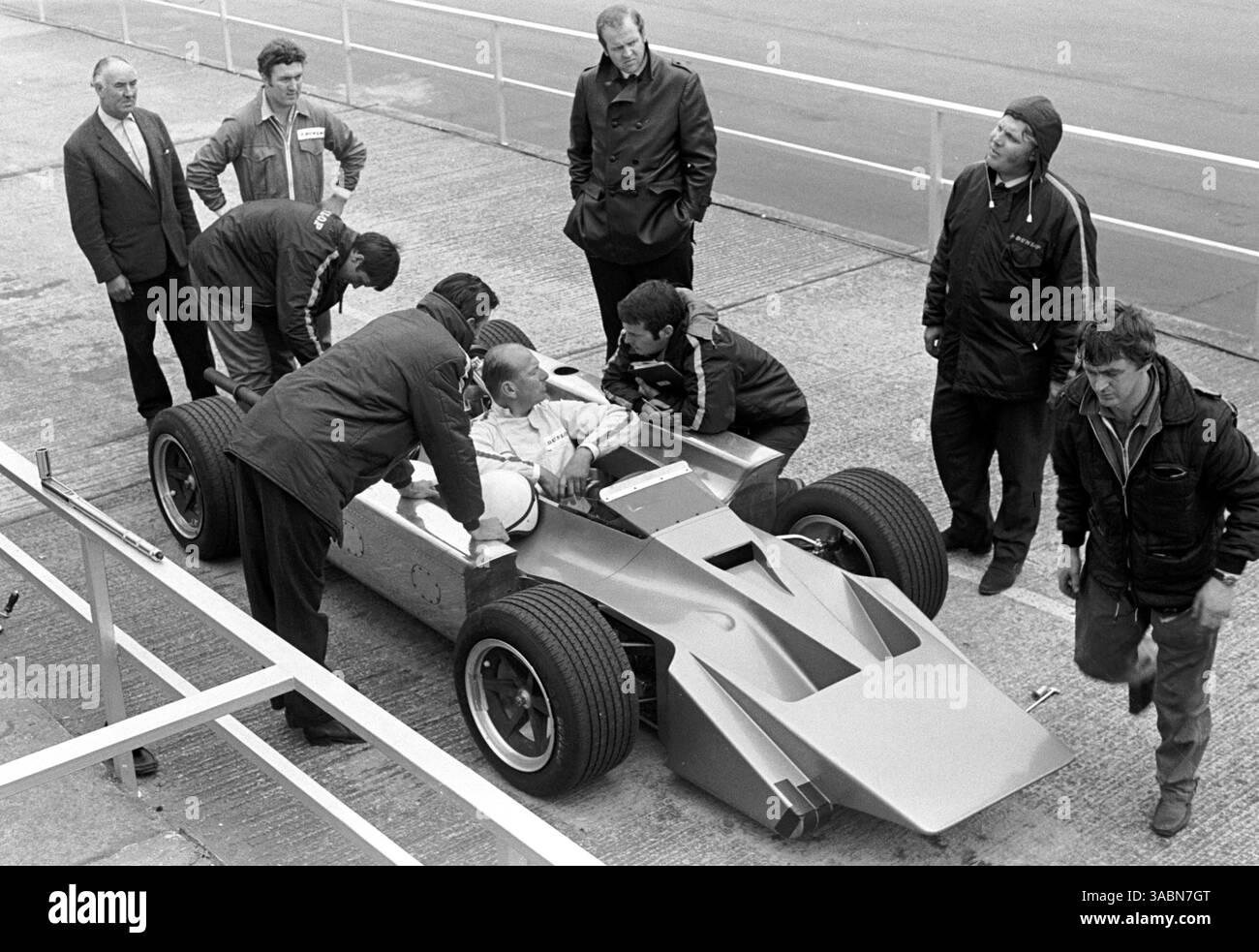 The Cosworth 4 wheel drive F1 car, here being driven by Mike Costin ...