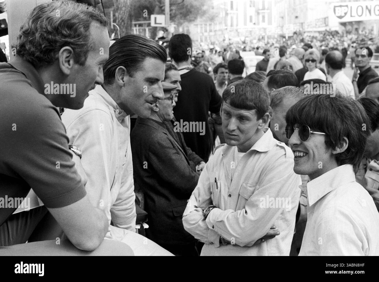 L to R): Colin Chapman (GBR) Lotus Team Owner; third placed Graham Hill ...