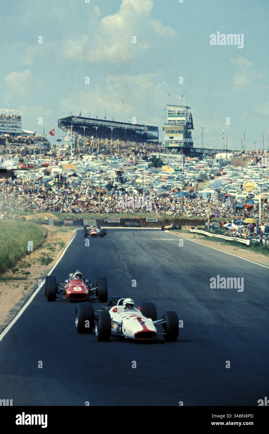 John Surtees (GBR) Honda RA300, leads Chris Amon (NZL) Ferrari 312..Formula One World ...