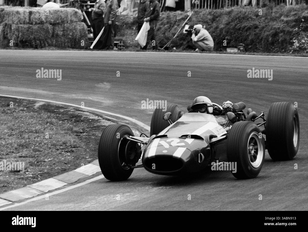John Surtees (GBR) Cooper T81 retired on lap 68 with a broken rear axle...British Grand Prix ...