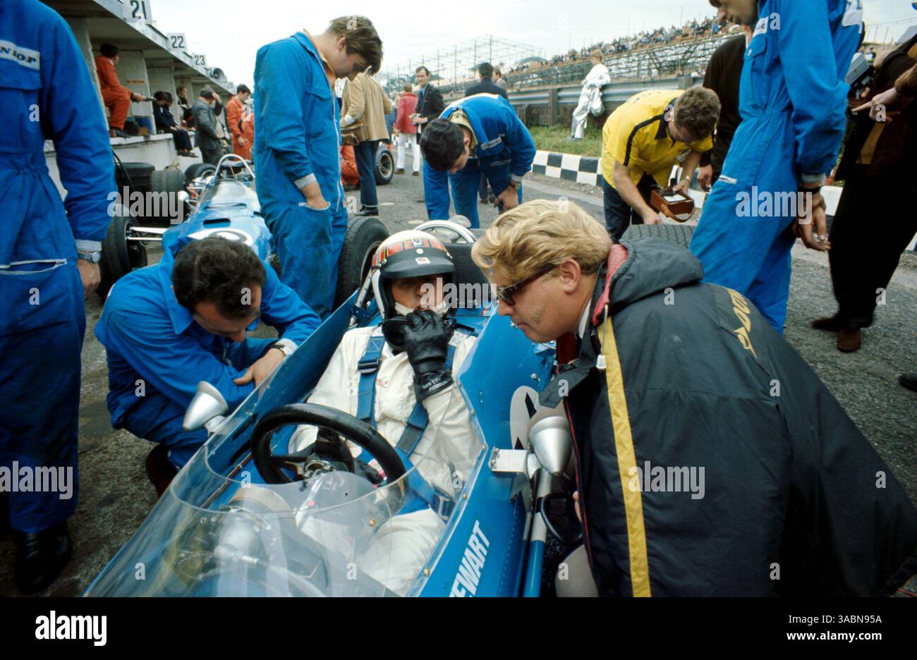 Jackie Stewart (GBR), Matra Cosworth MS10, talks to his engineer in the ...