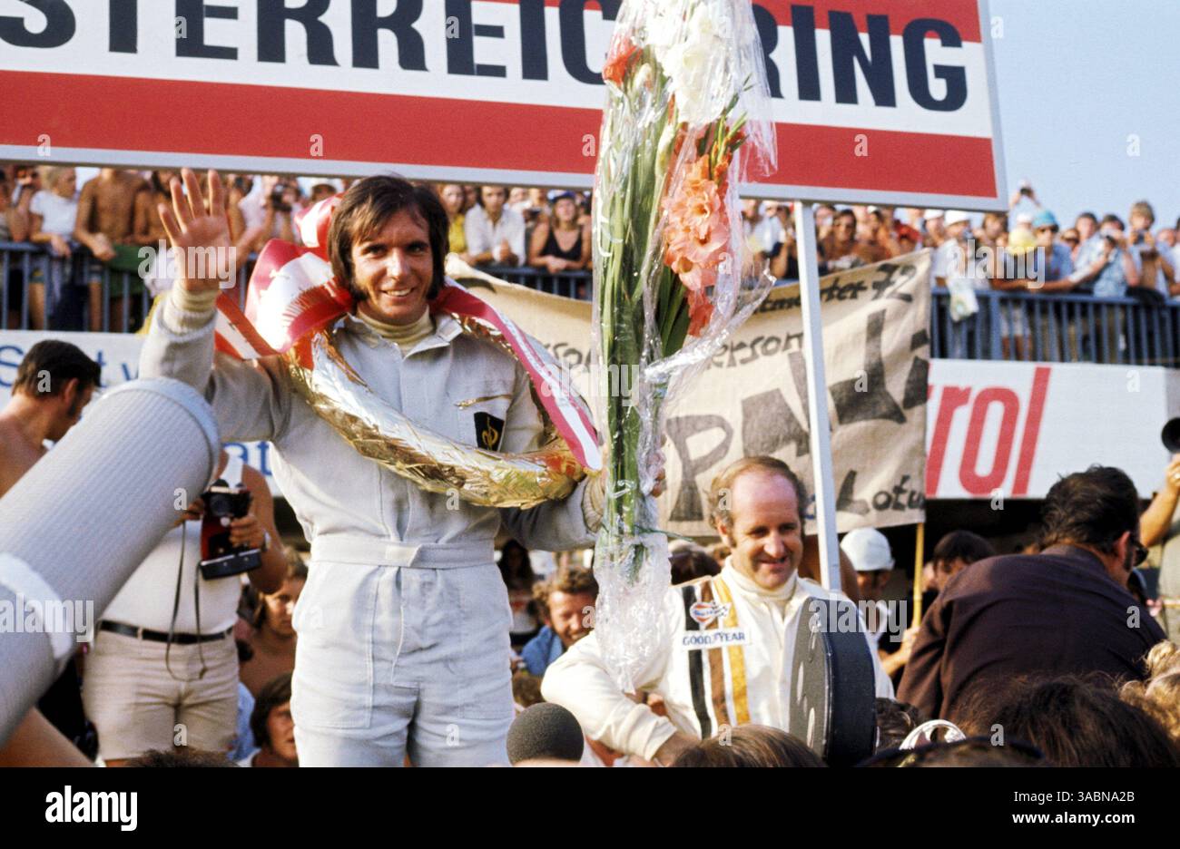 The podium (L to R): Emerson Fittipaldi (BRA) Lotus winner with second ...