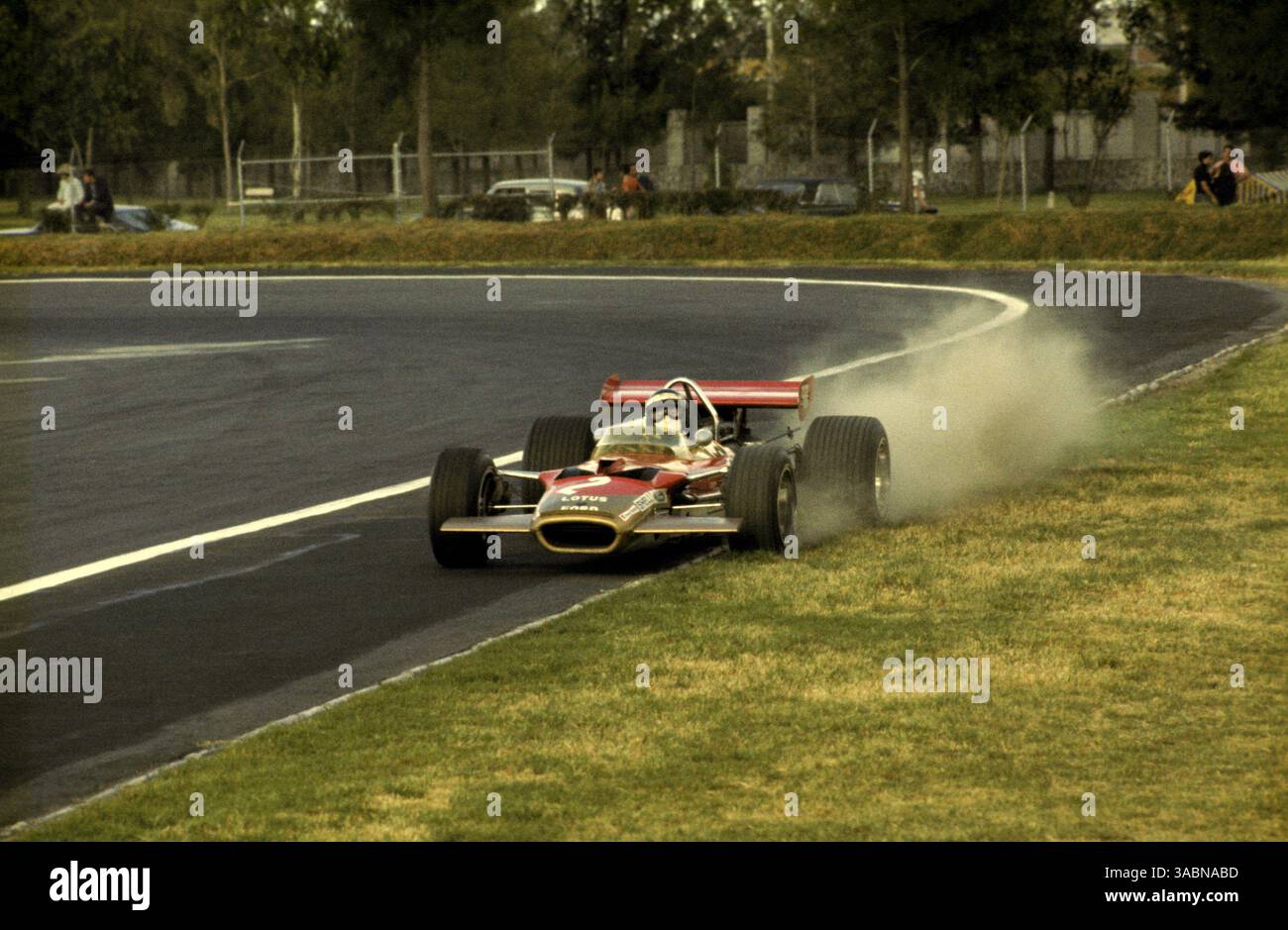 Jochen Rindt (AUT) Lotus 49B, kicking up the dust, retired on lap 22 with a broken suspension ...