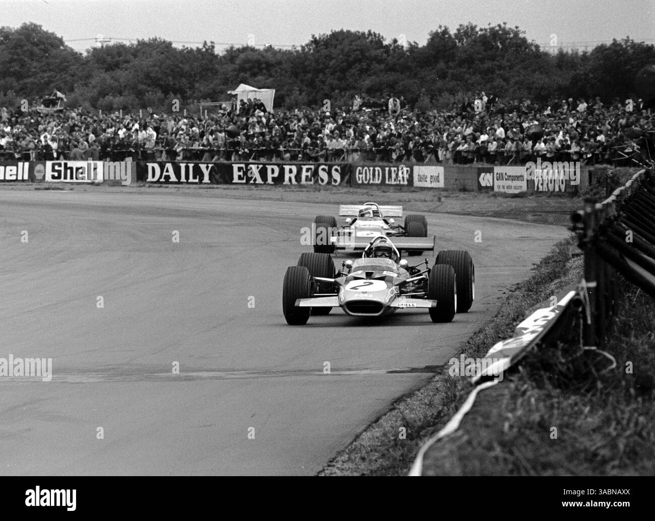Club corner, Winner Jackie Stewart(GBR) chases Jochen Rindt(AUT) Lotus ...